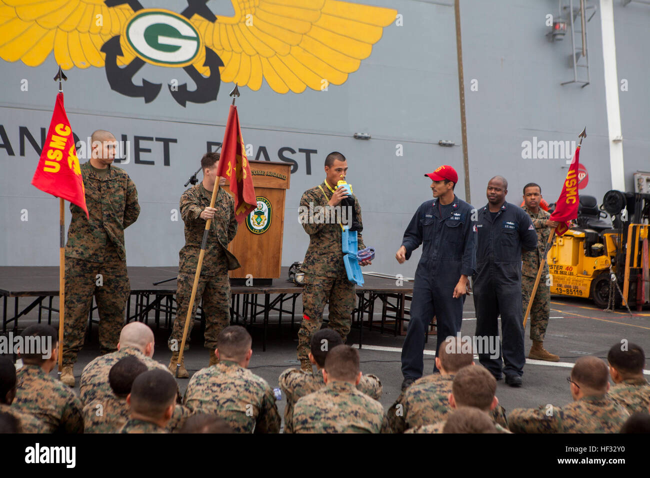 U.S. Navy Damage Controlman 1st Class Eduardo Quinteros assigned to the ...