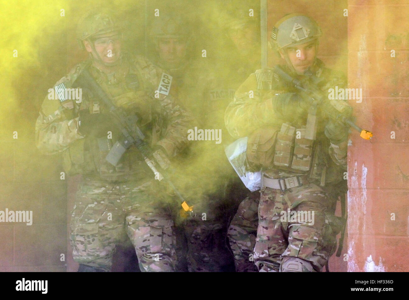 Members of the 274th Air Support Operations Squadron (ASOS) move toward ...