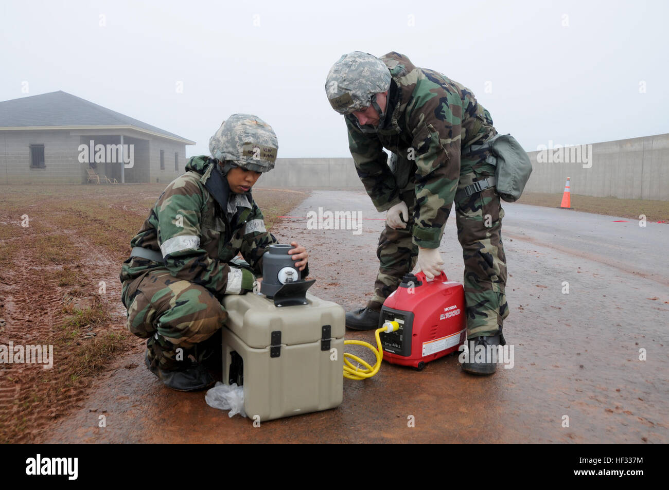 Air National Guard emergency managers operate a dry filter unit during ...