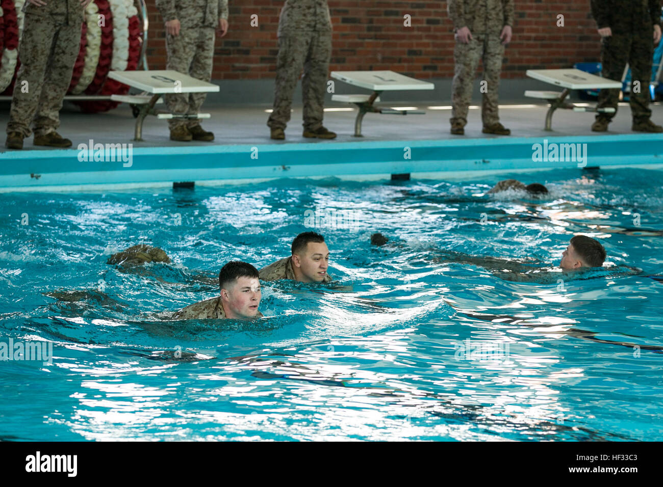 Marines with 2nd Radio Battalion swim across the pool in order to ...
