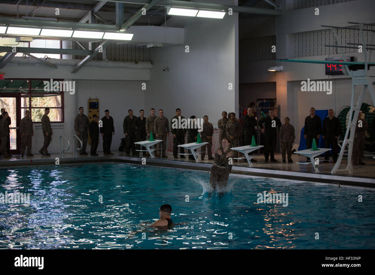Marines with Marine Forces Reserve jump off the high dive at Tulane ...