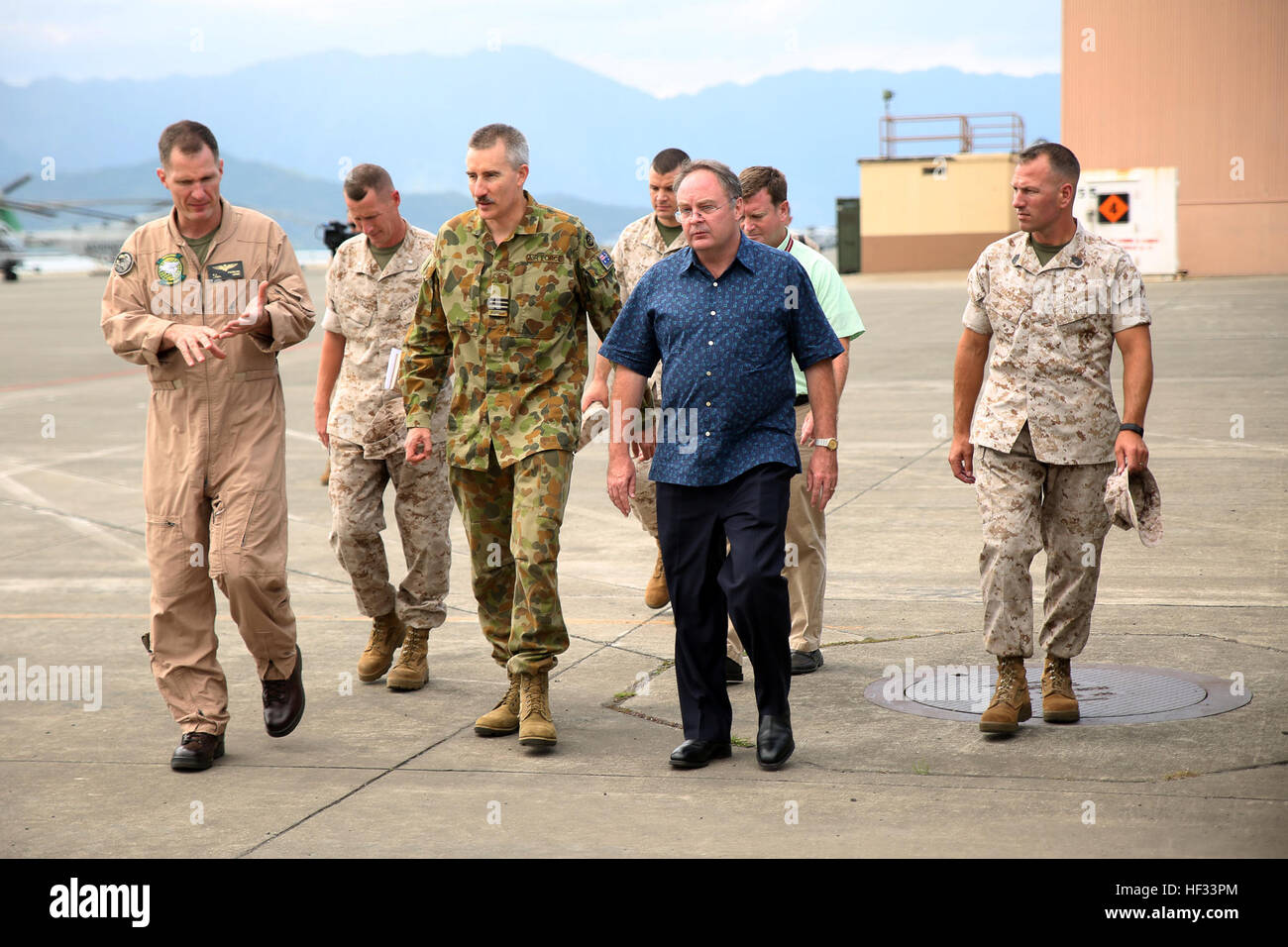Royal Australian Air Force Wing Group Commander Rohan Gaskill, center ...