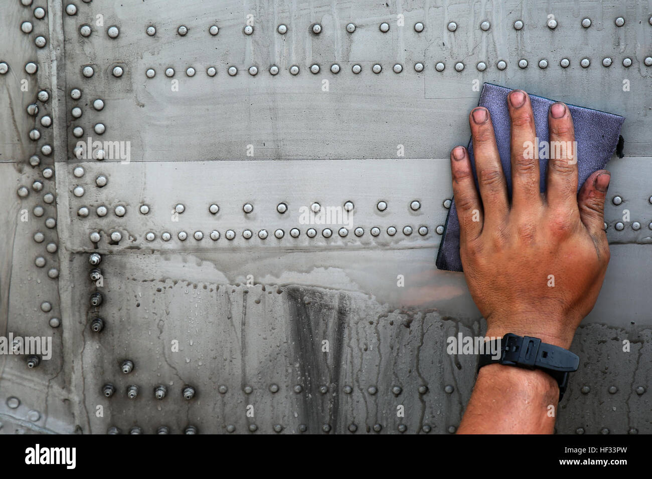 Hand washing a CH-53E Super Stallion helicopter is part of the 1,500 ...