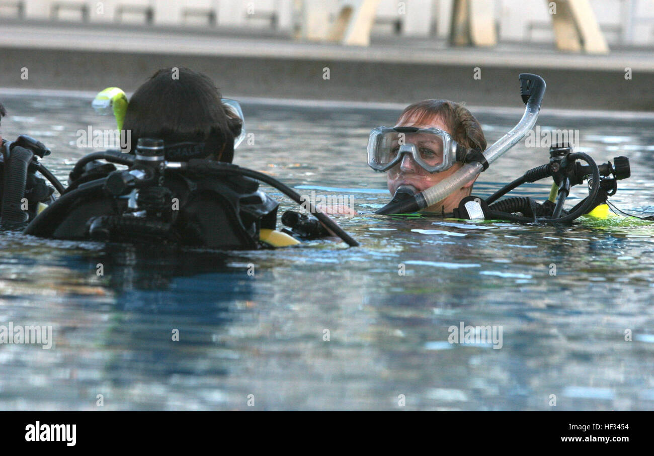 Mary Edwards, 50, from Oceanside, Calif., practices diving techniques ...
