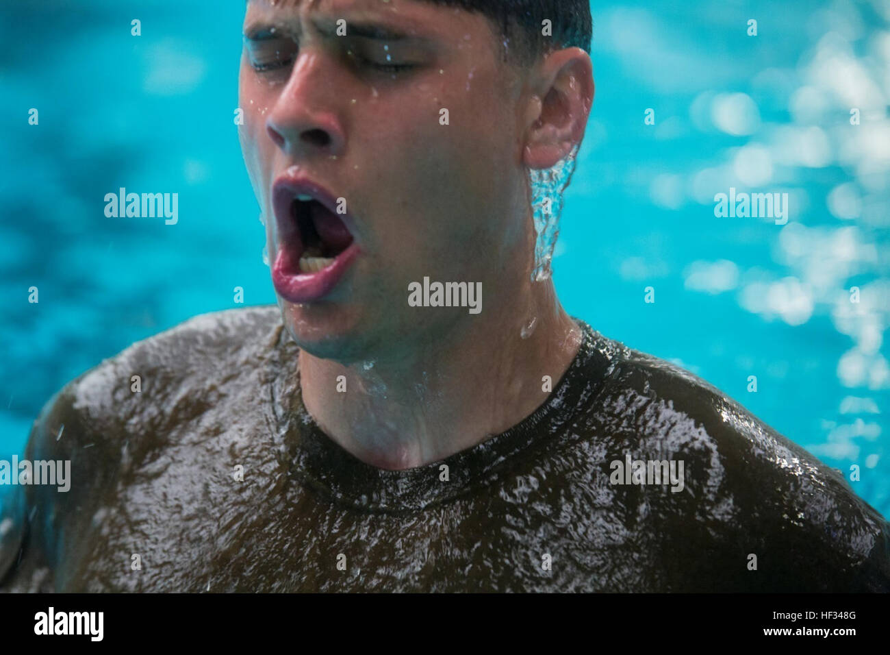 A Marine with 2nd Reconnaissance Battalion, 2nd Marine Division breaks ...