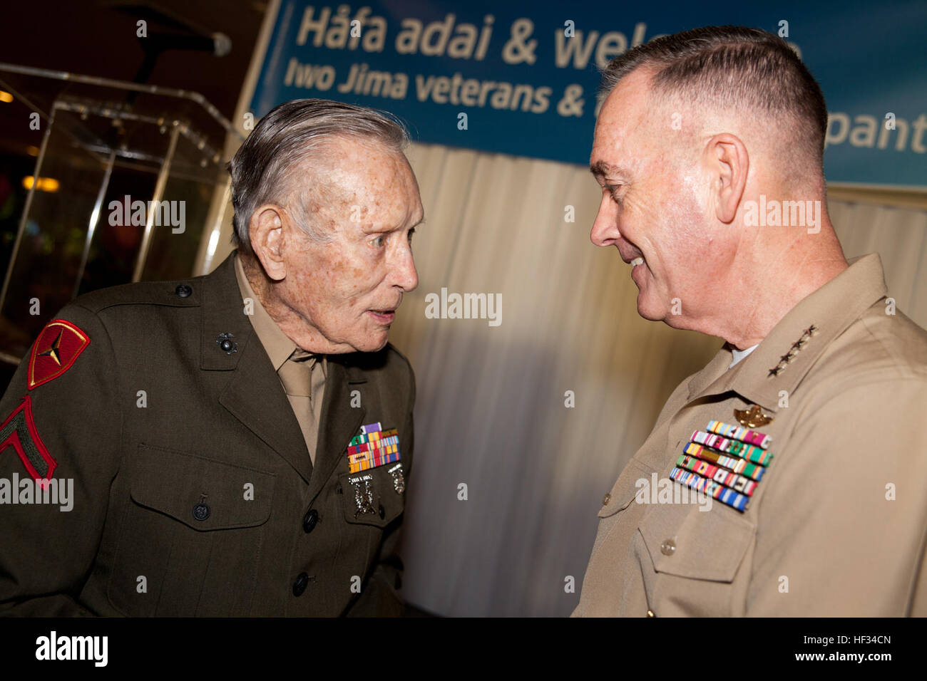 Commandant of the Marine Corps Gen. Joseph F. Dunford Jr. listens to a ...