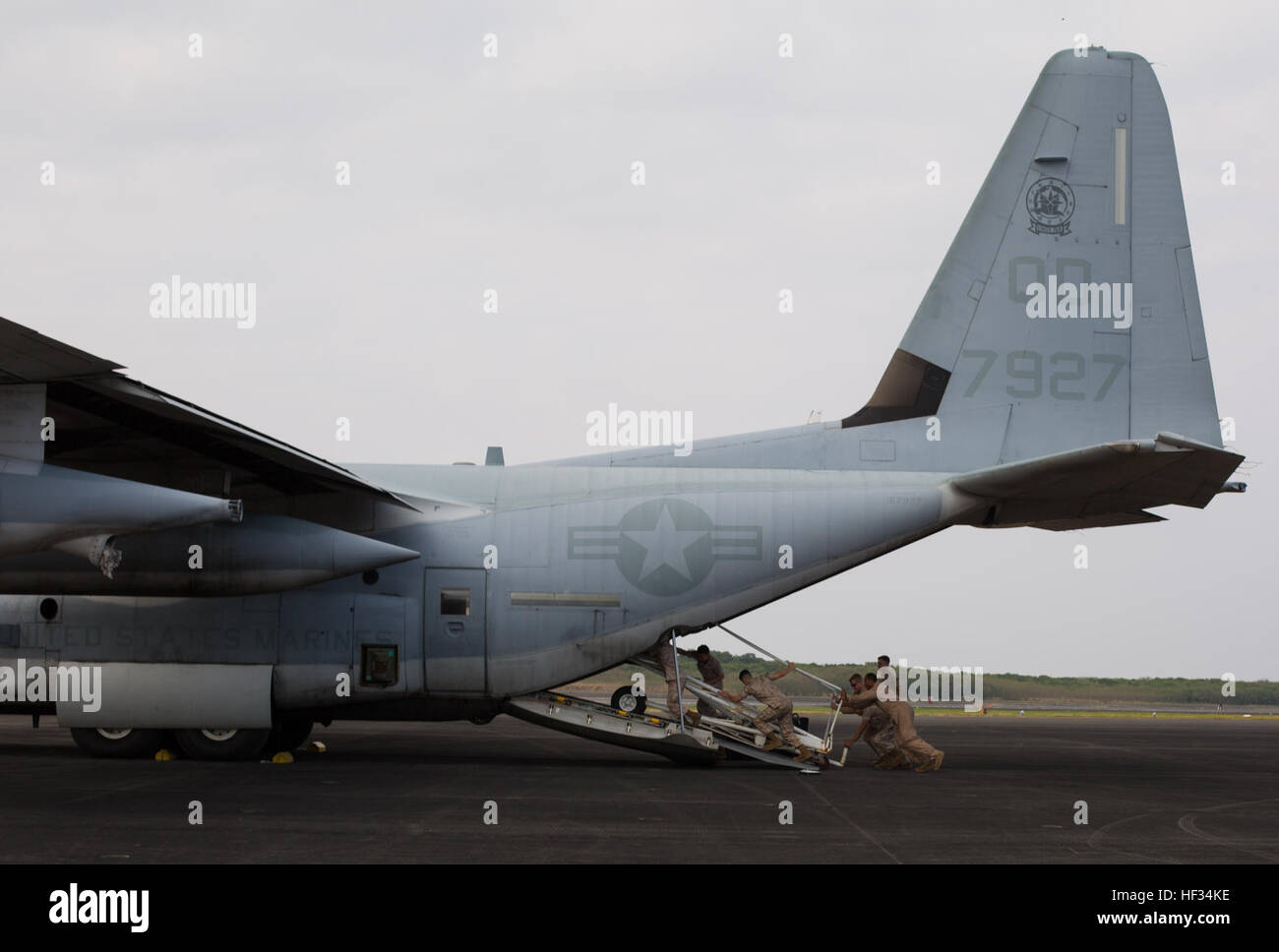 Marines with Marine Aerial Refueler Transport Squadron 152 load a ...