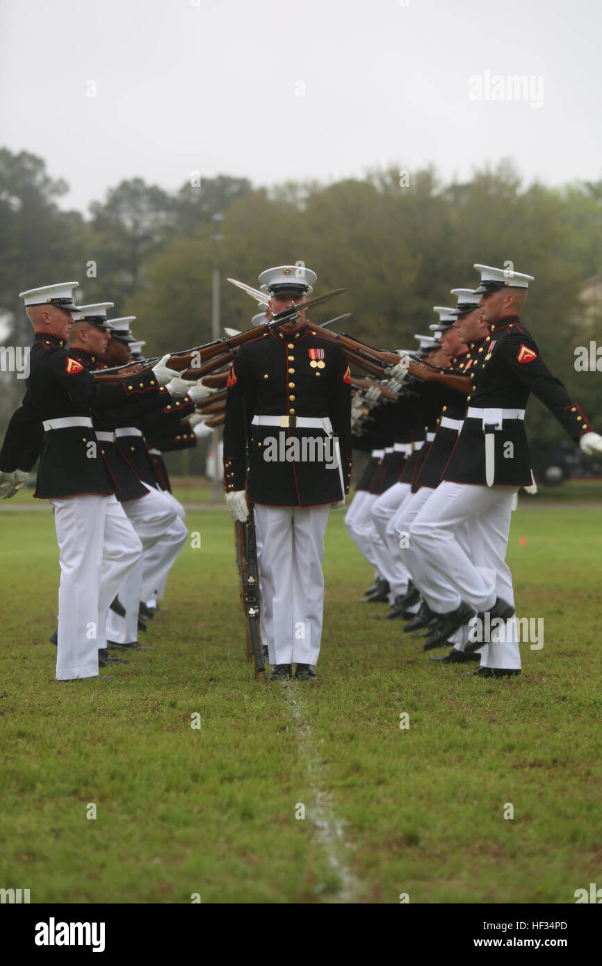 Marines assigned to The Marine Corps Silent Drill Platoon, as part of ...