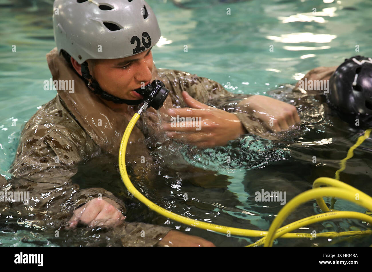 A Marine with the 26th Marine Expeditionary Unit practices using a ...