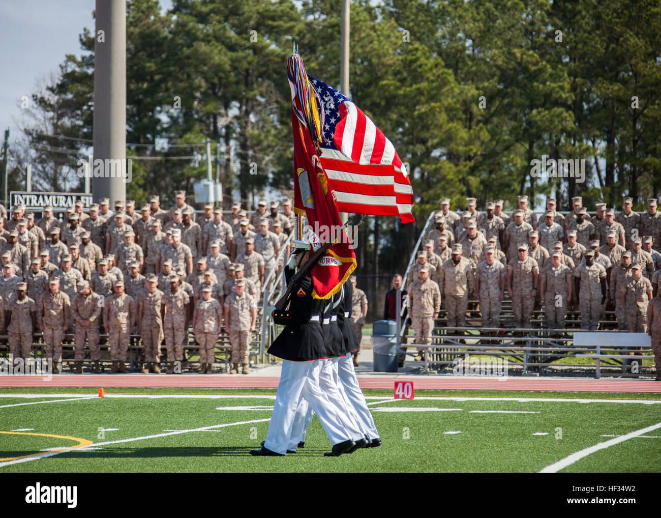 The U.S. Marine Corps Color Guard marches on during a Battle Color ...