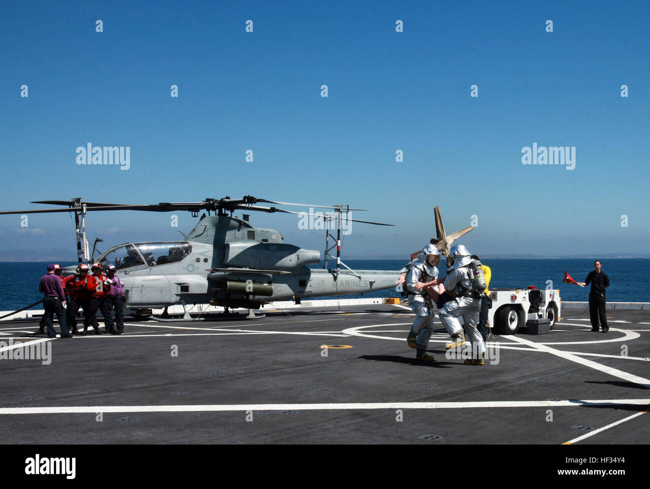 U.S. Navy Sailors aboard the USS Anchorage (LPD 23) transport a ...