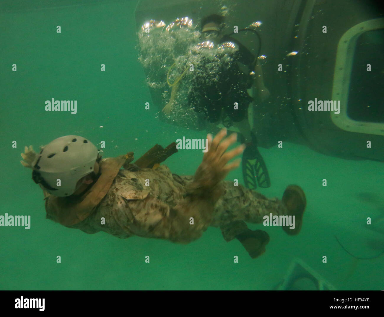 A Marine with the 26th Marine Expeditionary Unit conducts evacuation ...
