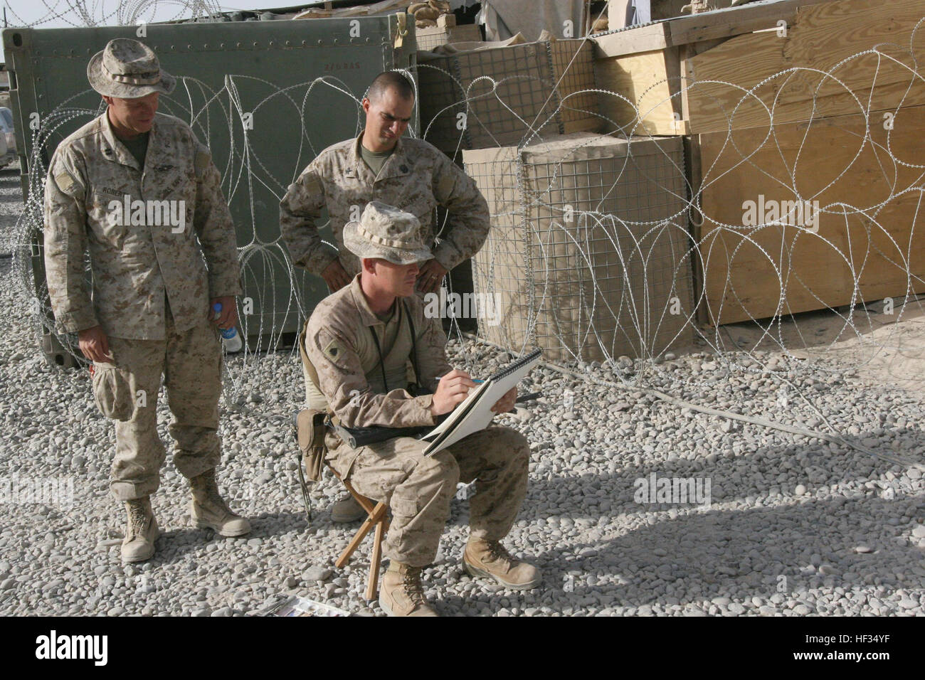 Sgt. Kirstopher J. Battles, one of two combat artists in the Marine ...