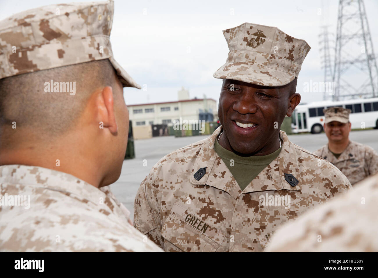 Sgt. Maj. of the Marine Corps Ronald L. Green listens to a Marine with ...