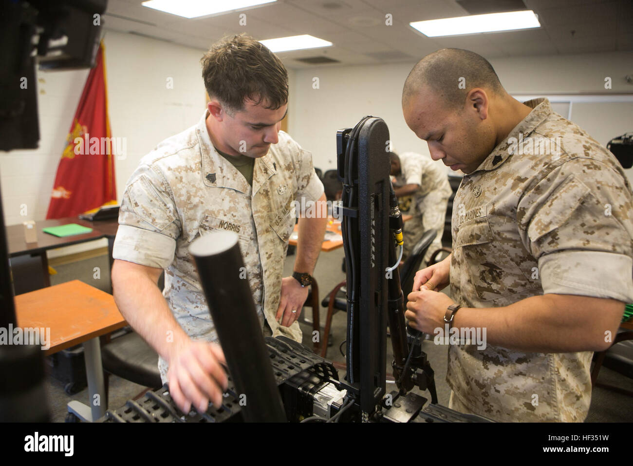 Sergeant Paul Faucheux, right, and Sgt. Jacoby Norris, explosive ordnance disposal technicians ...