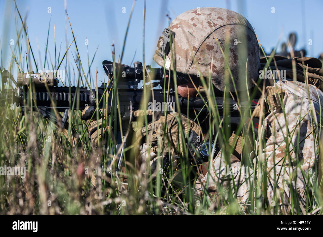 U.S. Marine Cpl. Heath Crouch provides security during a beach assault ...
