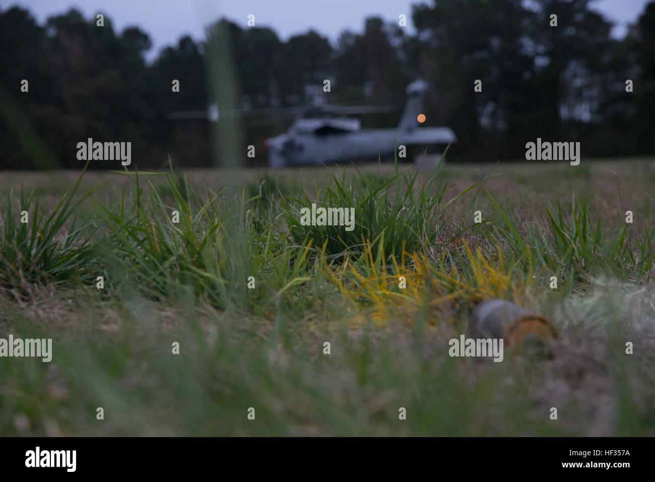 An SH-60 Seahawk Helicopter touches down after a canister of signal ...