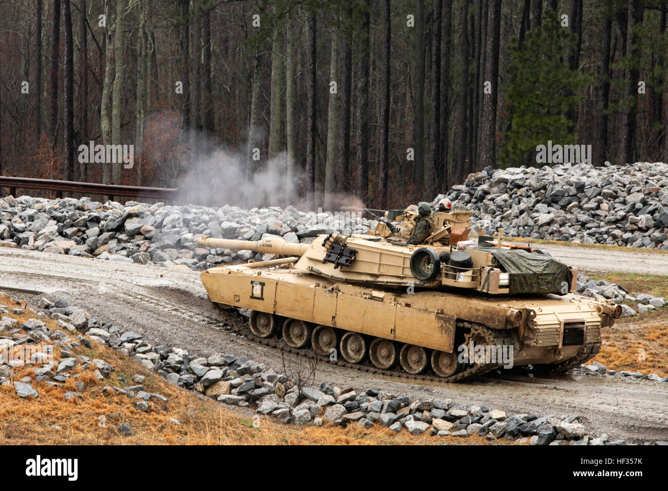 An M1A1 Abrams tank with 2nd Tank Battalion, 2nd Marine Division fires ...