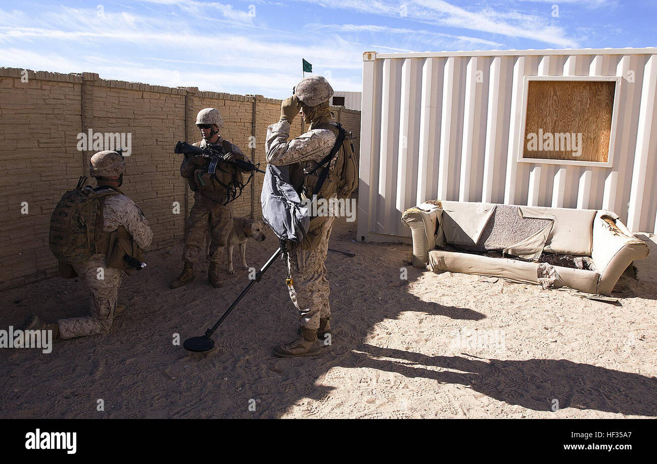Lance Cpl. Daniel Schueller, dog handler, of Alden, N.Y., and Lance Cpl ...