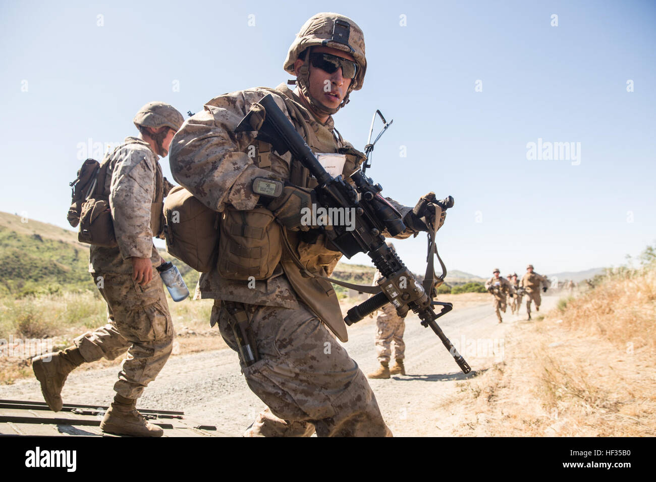 U.S. Marine Sgt. Paul Luna exits an AAV-7 Amphibious Assault Vehicle ...