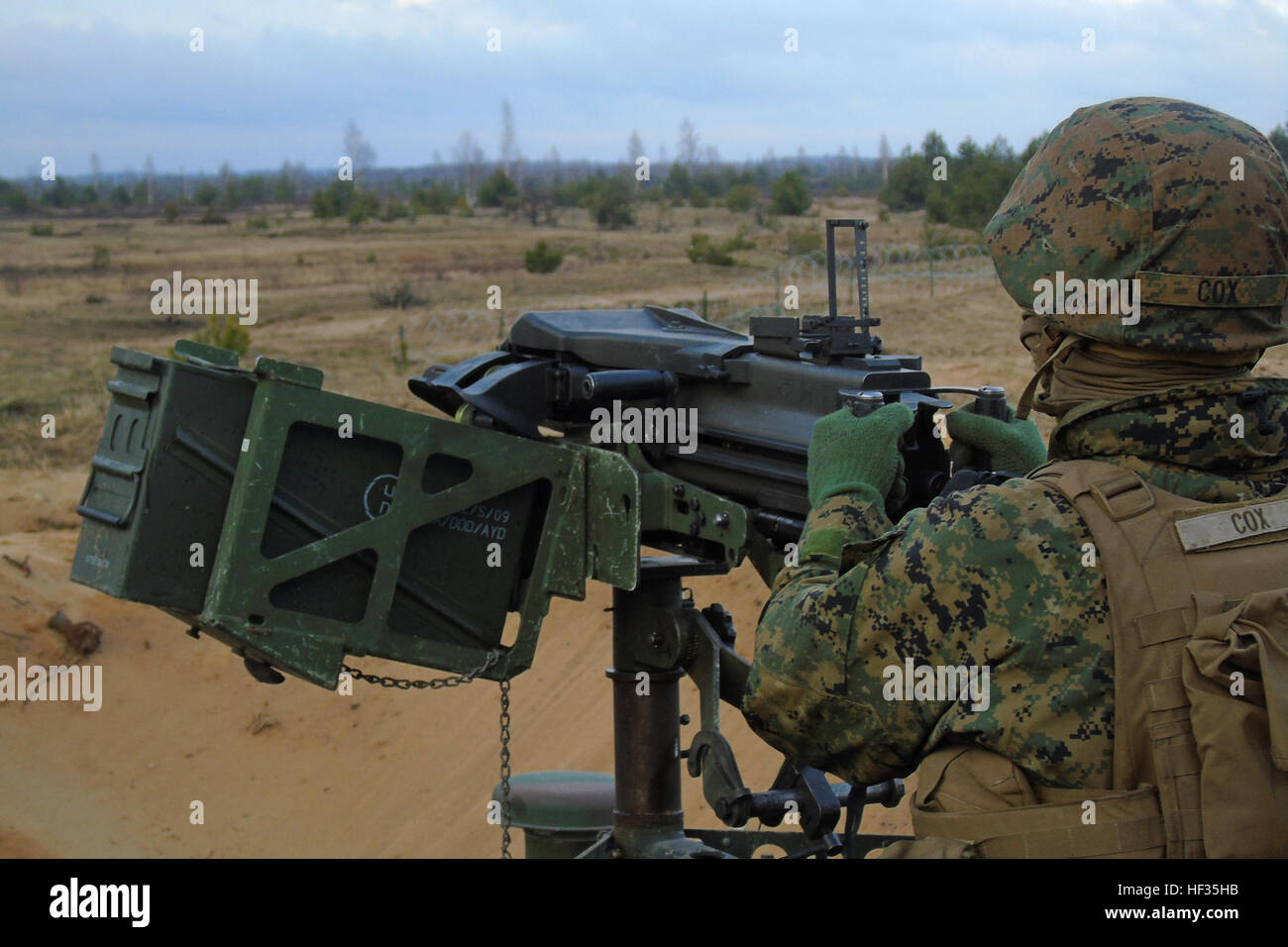 A U.S. Marine with Weapons Company, Black Sea Rotational Force, fires a ...