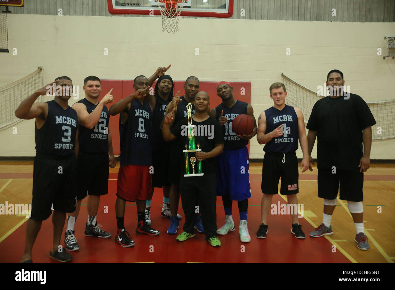Marine Corps Air Station took the trophy in the intramural basketball ...