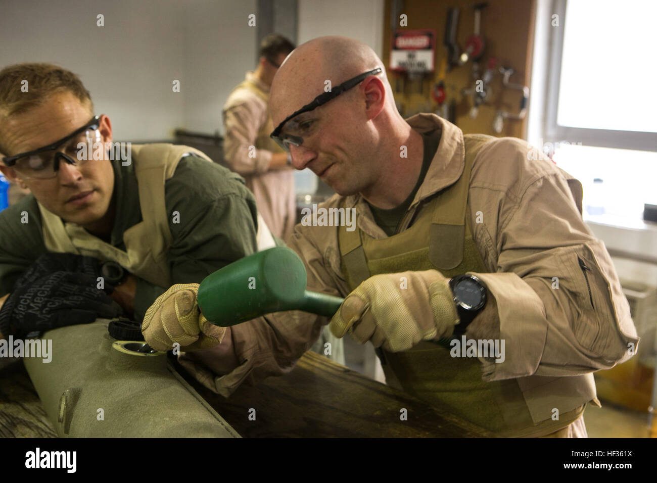 Sergeant Derek Ford, an explosive ordnance disposal technician with 2nd EOD Company, 8th ...