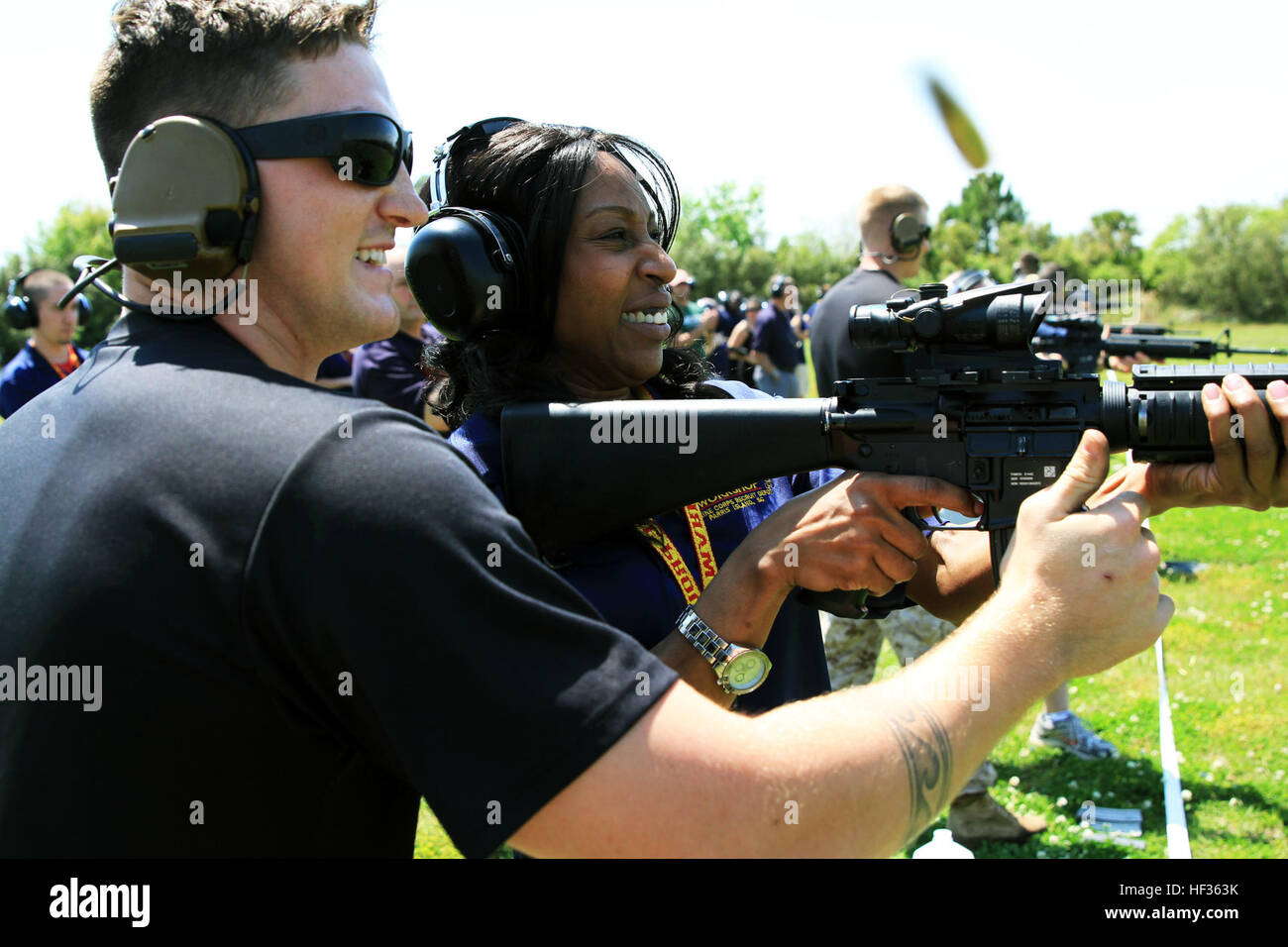 Kali Coleman fires an M-16A4 service rifle during the Educators ...