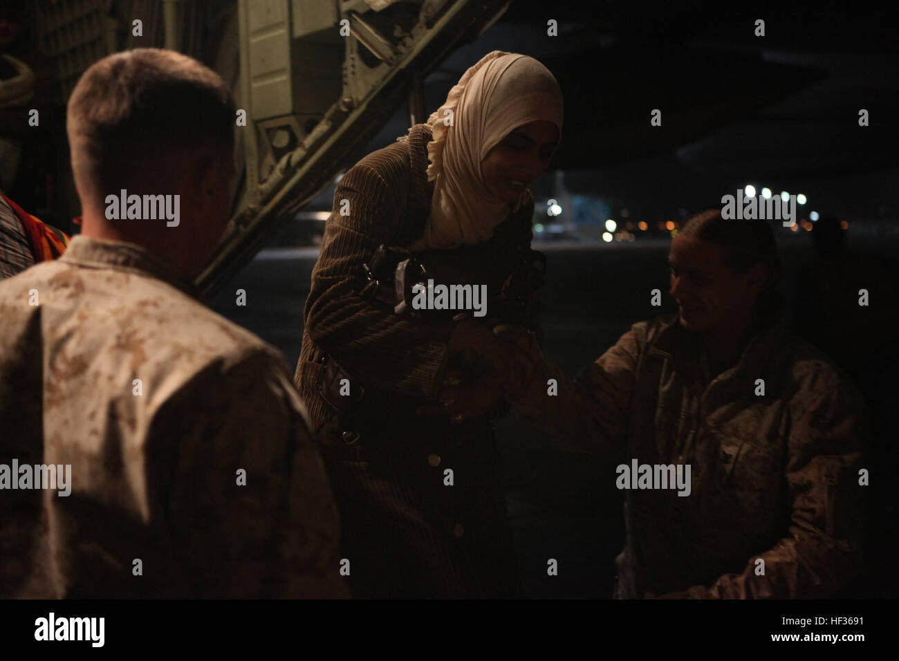 Petty Officer 3rd Class Katherine Rowan, right, a hospital corpsman ...