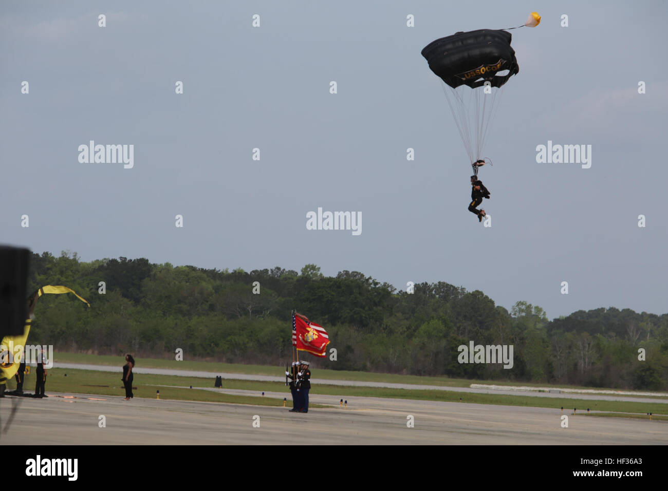A member of The Special Operations Command Parachute Team descends ...