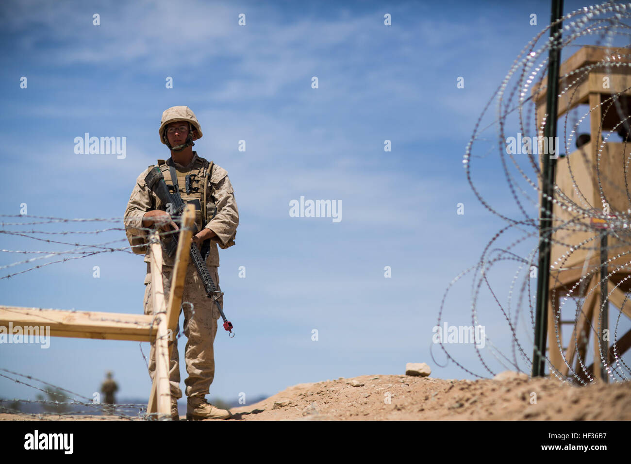 U.S. Marine Corps Lance Cpl. Forest C. Wyly, a water purification ...
