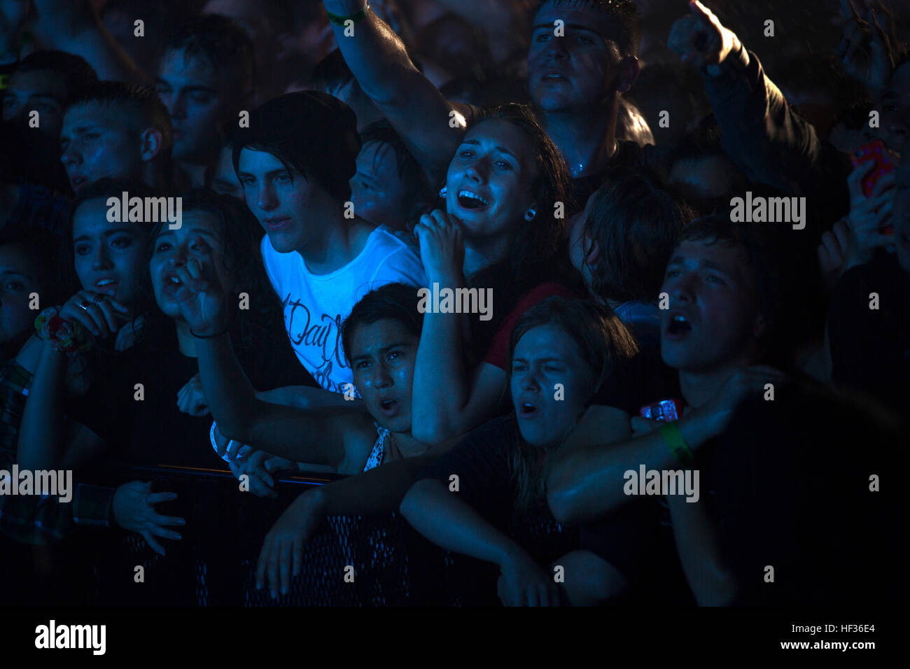 Fans scream and swoon while listening to the headlining band of Foster ...