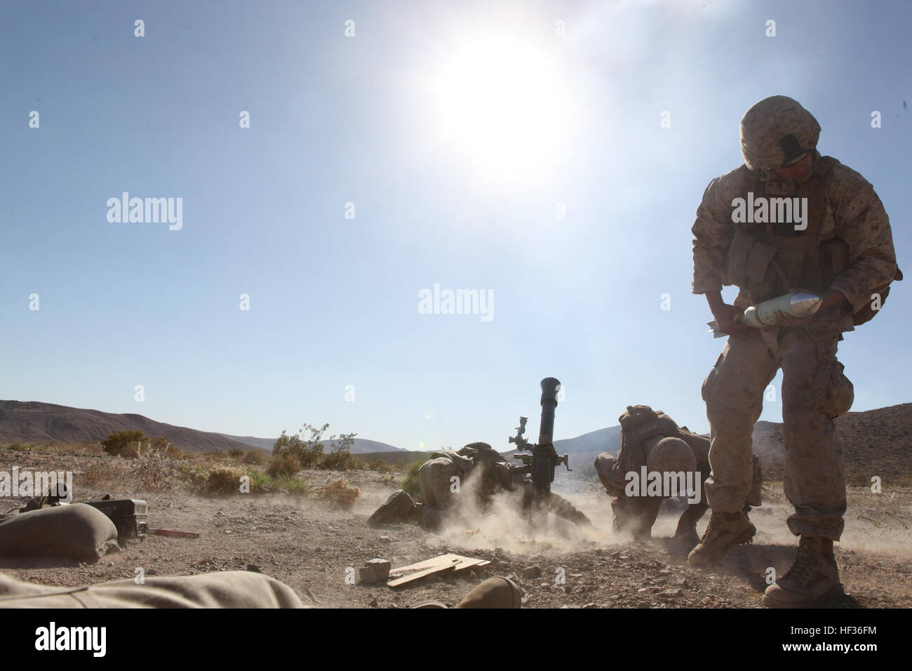 Mortarmen with Weapons Company, 3rd Battalion, 5th Marine Regiment fire ...