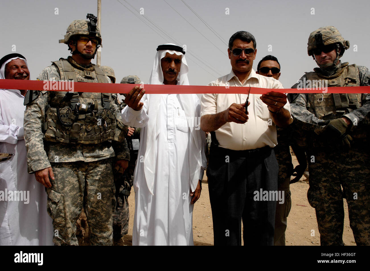 (L to R) U.S. Army Capt. Marc Austin, company commander, with ...