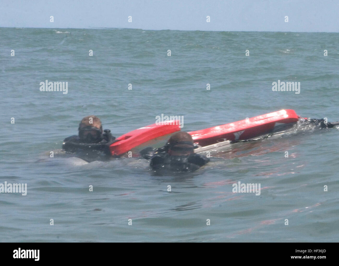Marines with 2nd Reconnaissance Battalion, 2nd Marine Division, prepare the Dive Propulsion ...