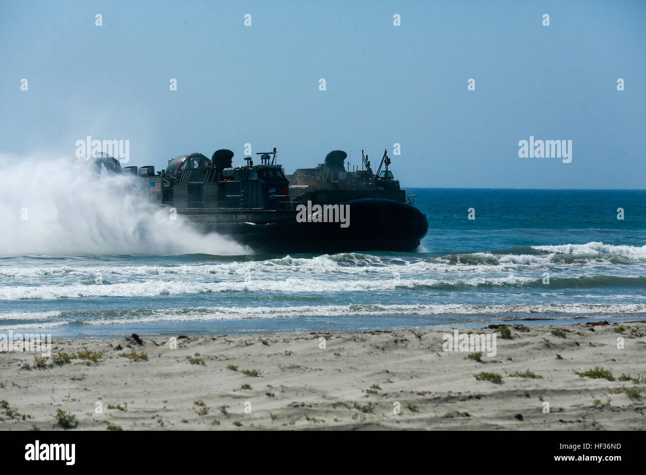A landing craft, air cushion, comes ashore during Certification ...