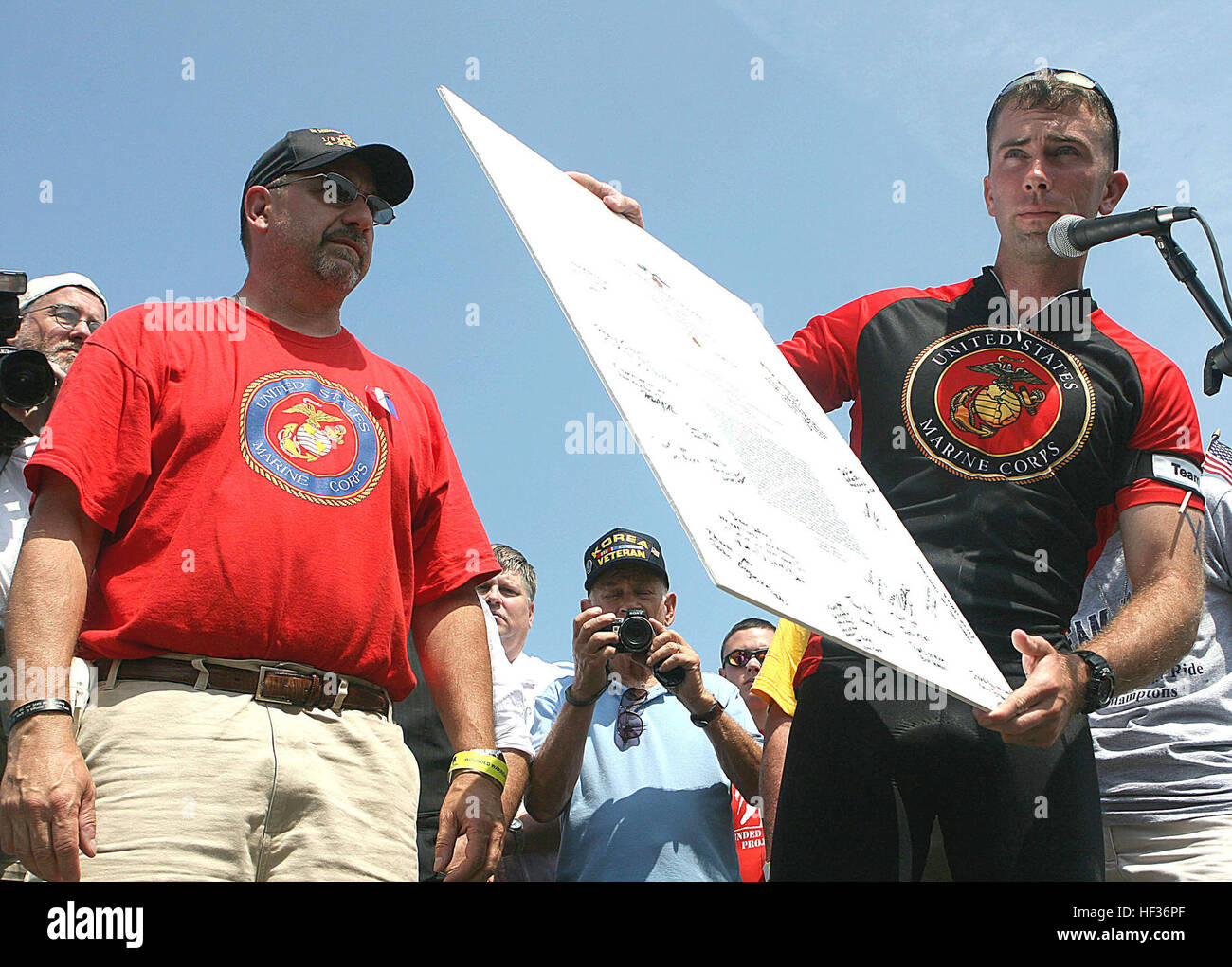 First Lt. Daniel J. Runzheimer (right), the Weapons Platoon commander ...