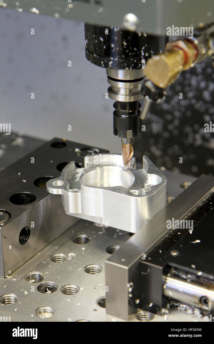 The computer numerical controlled machining system completes an early ...