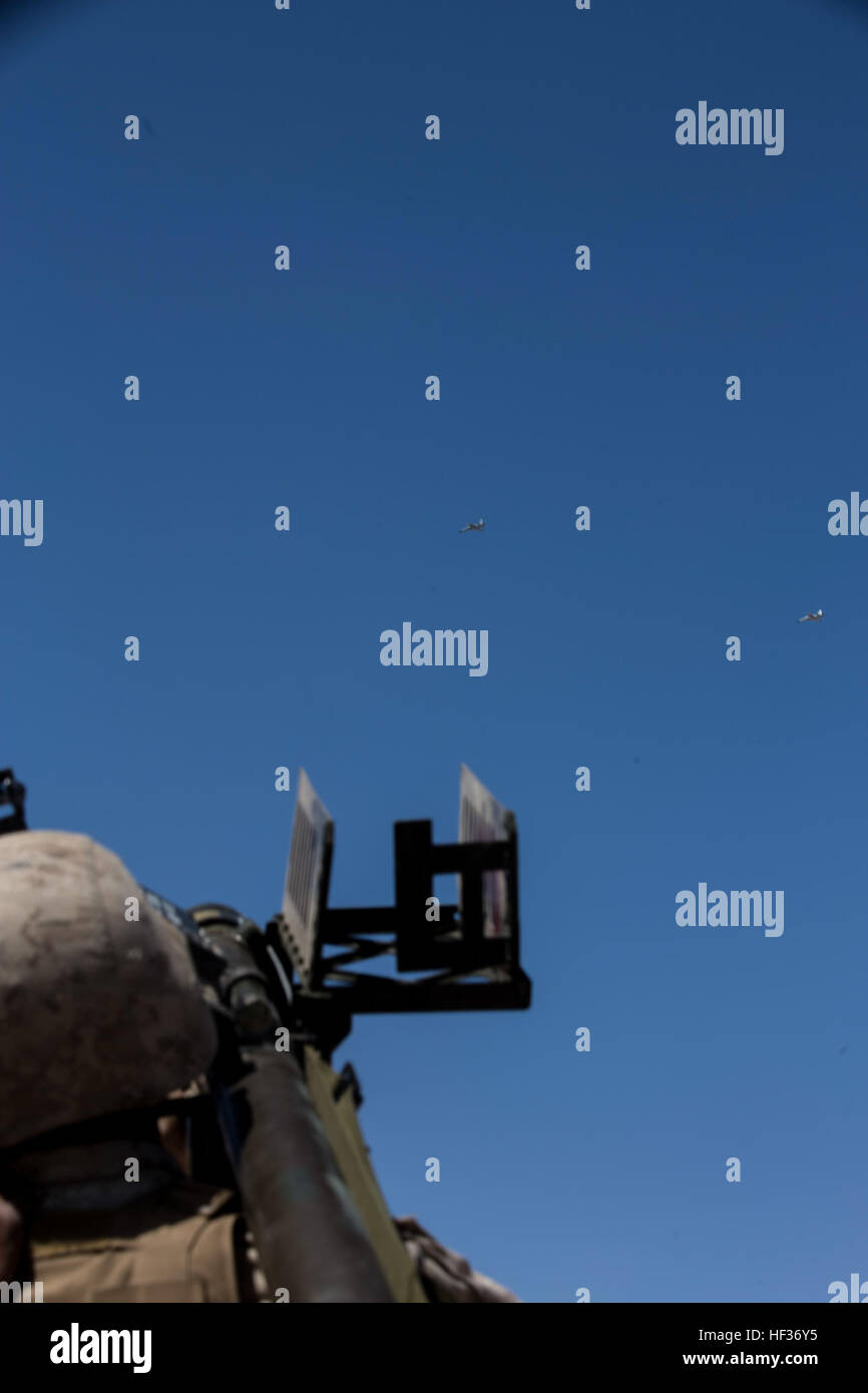 A low altitude air defense gunner from 2nd LAAD Battalion engages a ...