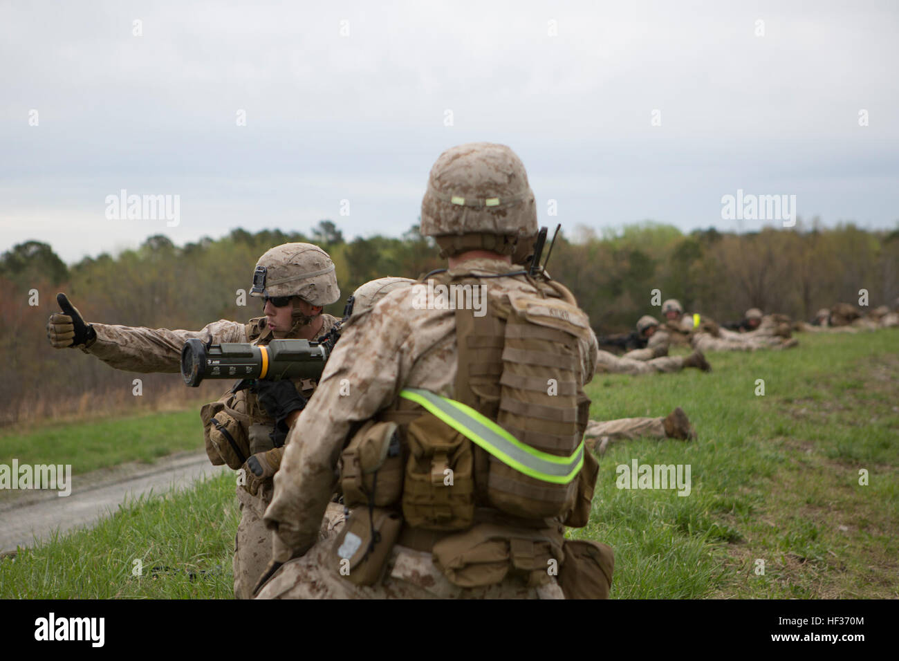 A U.S. Marine with Fox Company, Battalion Landing Team 2/6, 26th Marine ...