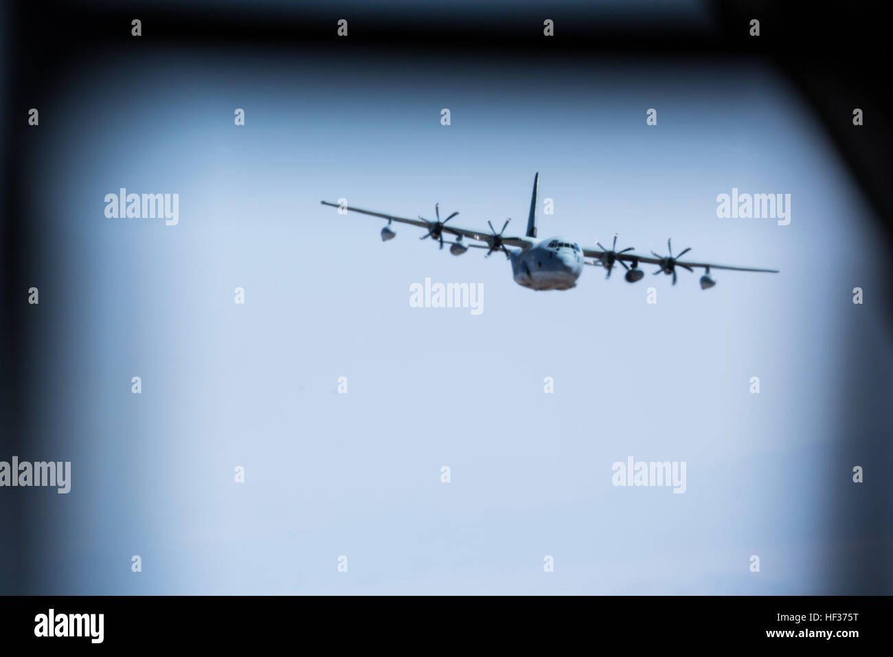 A U.S. Marine Corps KC-130J Hercules flies in formation during an ...