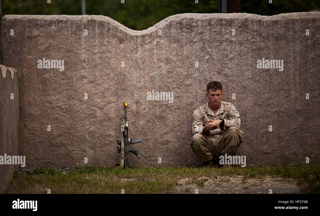 U.S. Marine Corps Cpl. Michael Hansen, an assaultman assigned to ...