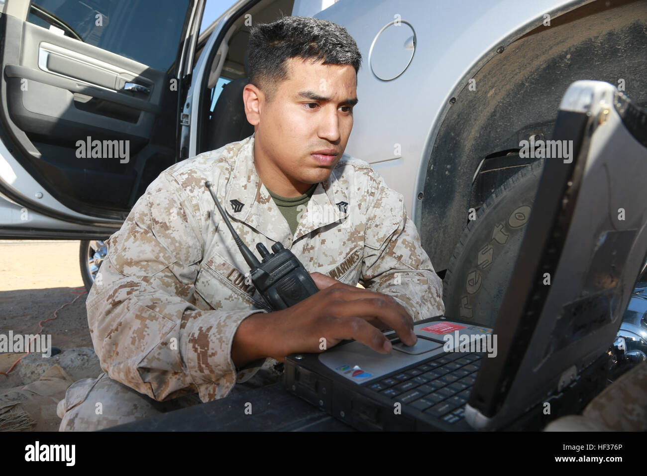 U.S. Marine Corps Sgt. Jesse Luna, a radio operator assigned to Marine Air Control Group 38, 3rd ...