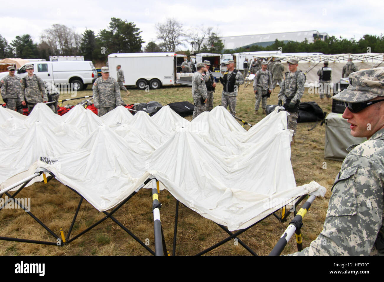 U.S. Army Soldiers from the New York Army National Guard set up tents ...