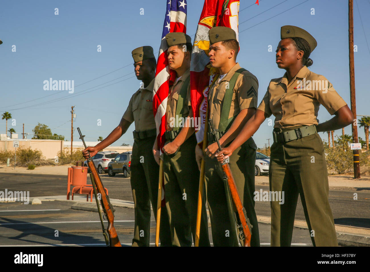 The Marine Corps Air Ground Combat Center Color Guard stands at parade ...