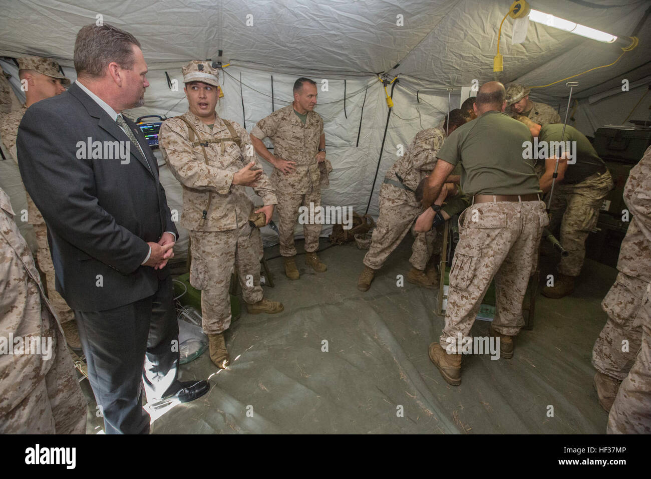 U.S. Marines with 2d Marine Logistics Group greet Mr. Bryan H. Wood ...