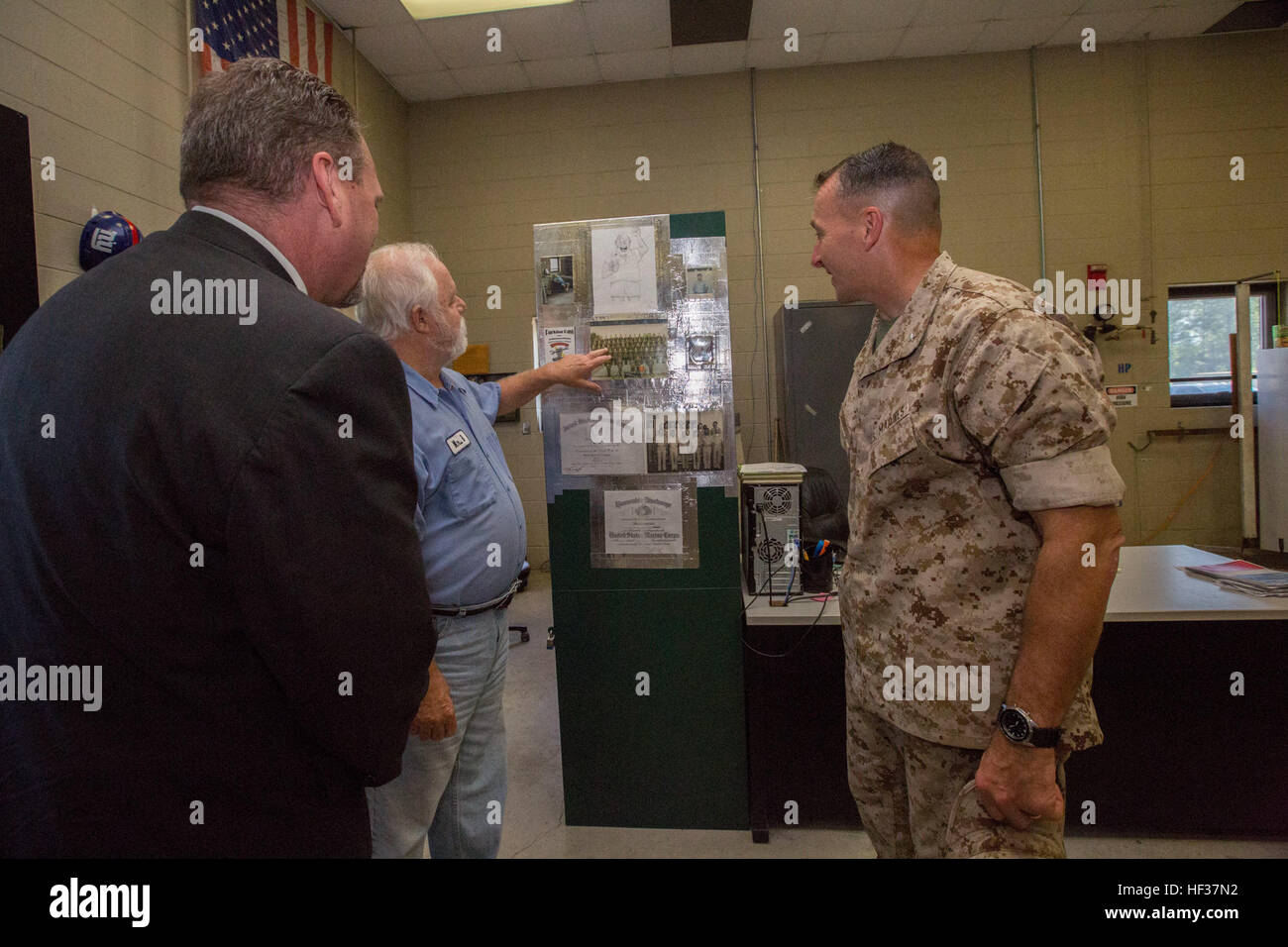 U.S. Marines with 2d Marine Logistics Group greet Mr. Bryan H. Wood ...