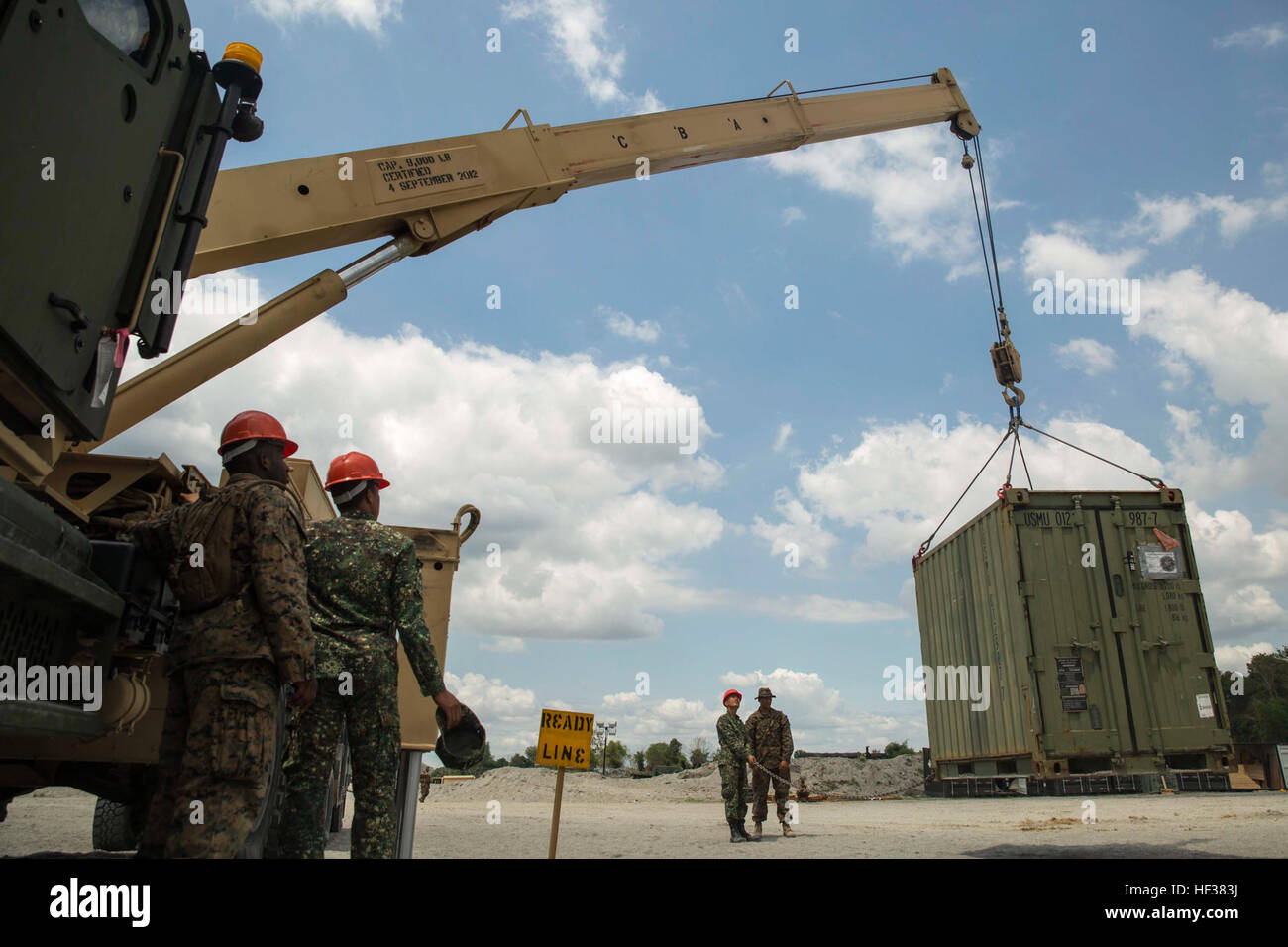 Philippine and U.S. Marines move a 20-ton storage container with a MKR ...