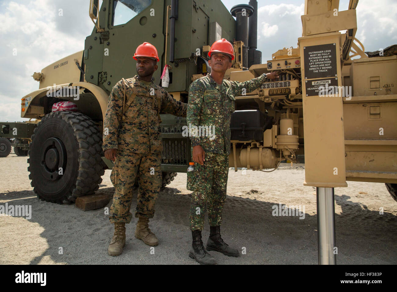 Philippine Marine Tech Sgt. Jaime Alejado controls the crane on a MKR ...