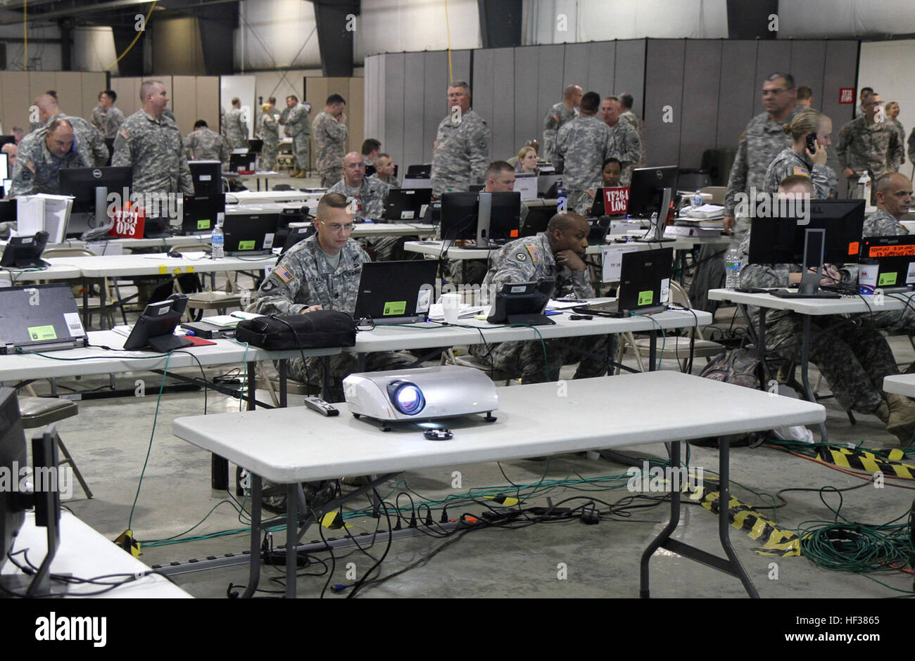 Soldiers with Task Force 38 monitor incoming communications during a ...